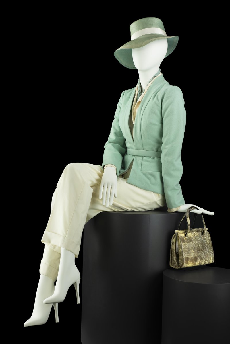 Period mint cashmere jacket with ivory wool twill trousers worn by ...